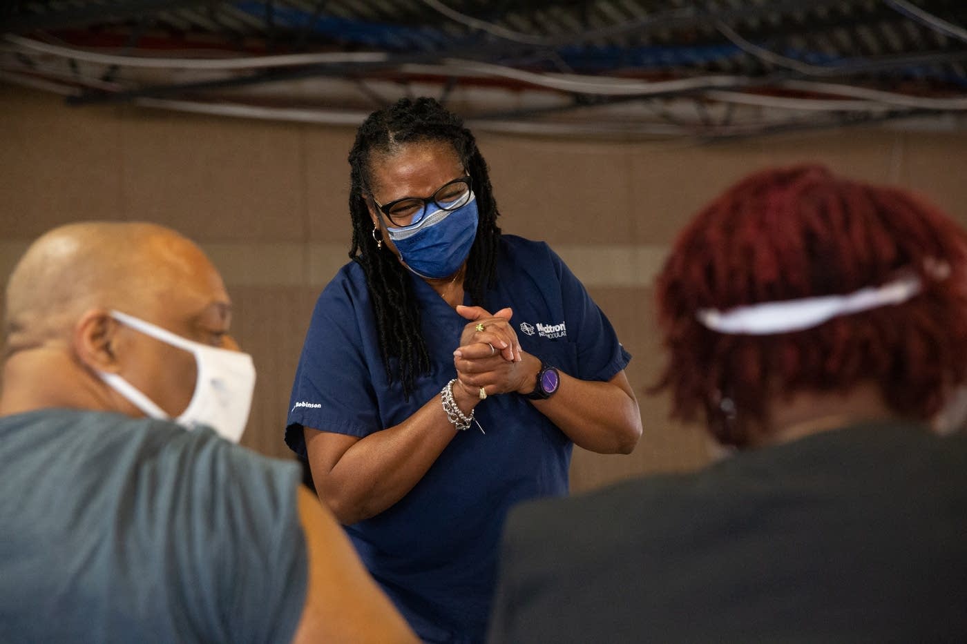 Black nurse volunteers give shots to Minnesota's most vulnerable | MPR News